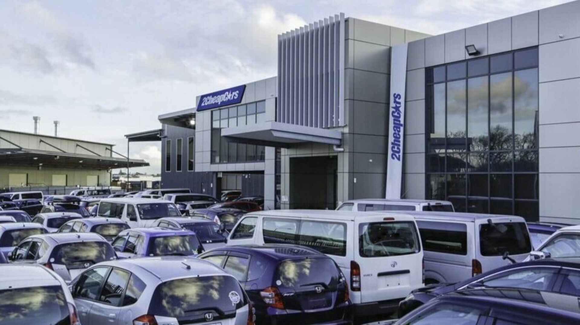 Autofile News Profit Forecast Down